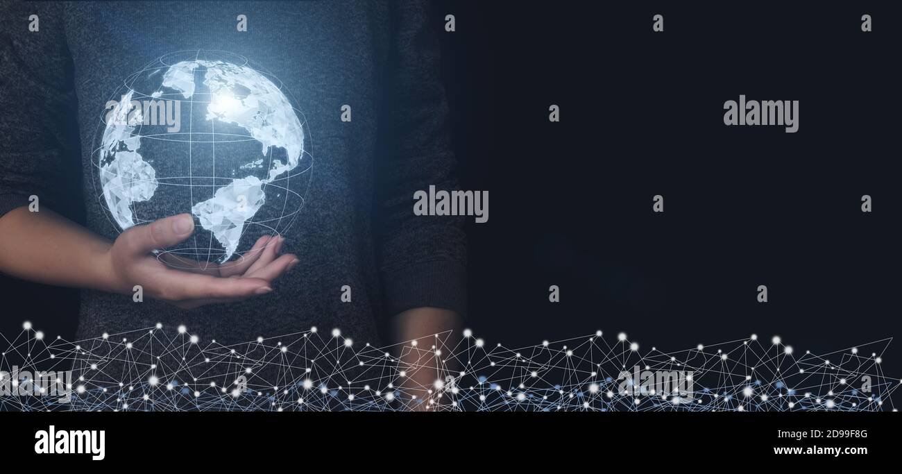 Hand holding flying earth network global connection concept ...