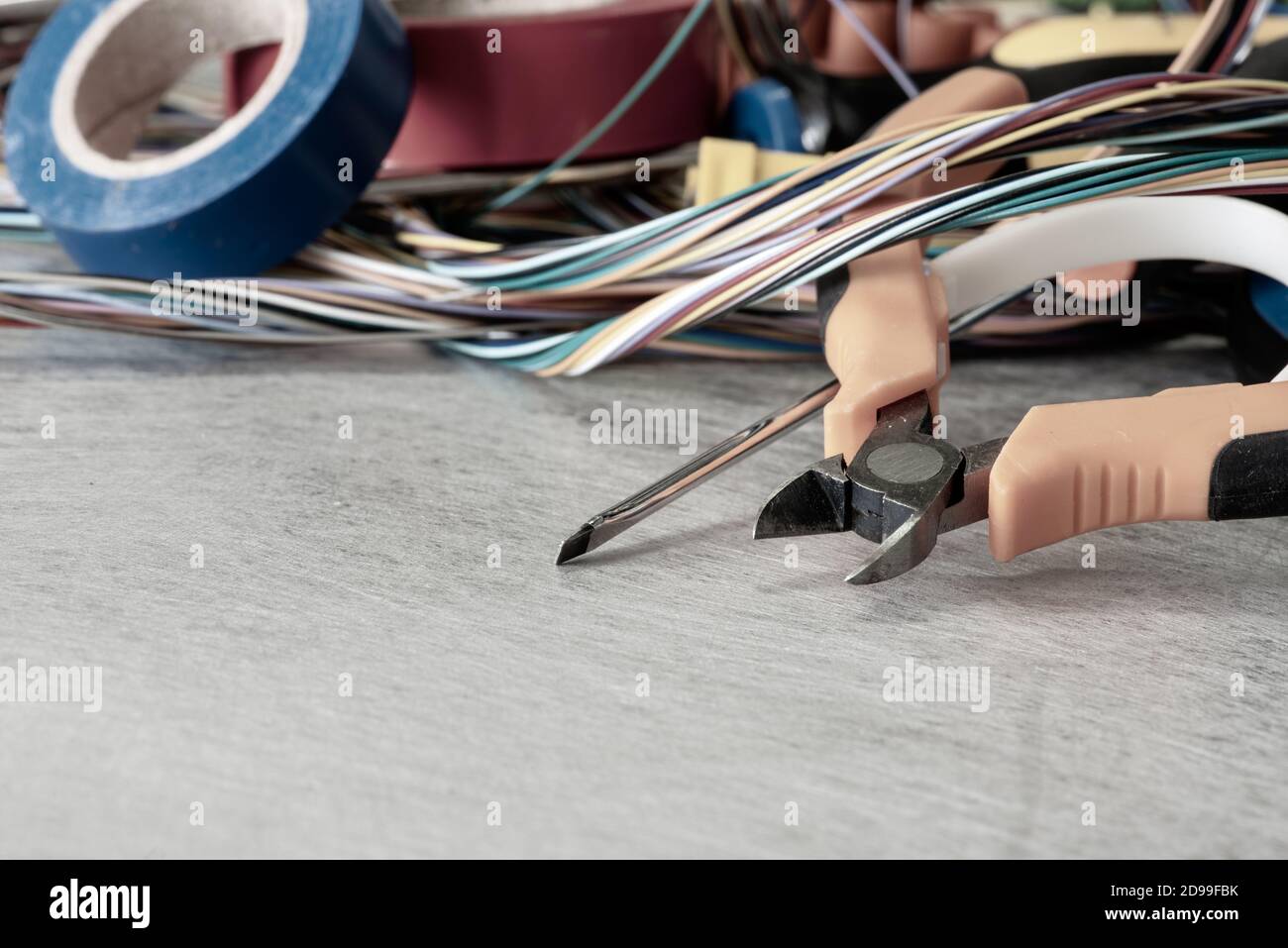 Set of tools and cables used in electrical home installation, closeup ...