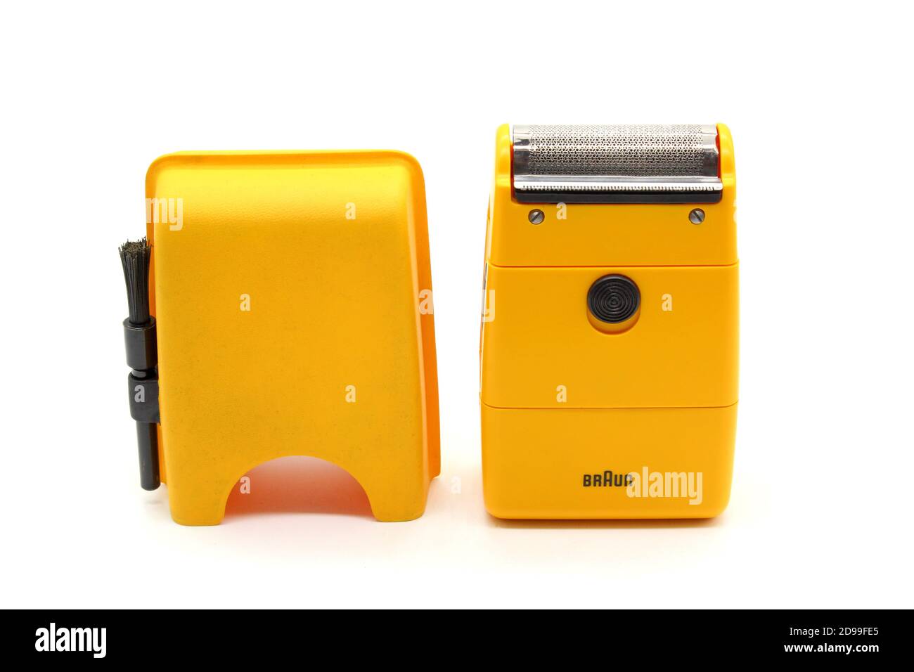 Vintage Braun yellow electric shaver, isolated on white background ...