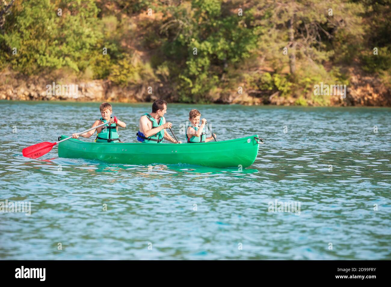 Family canoeing on Esparron de Verdon lake, Esparron de Verdon, Alpes ...