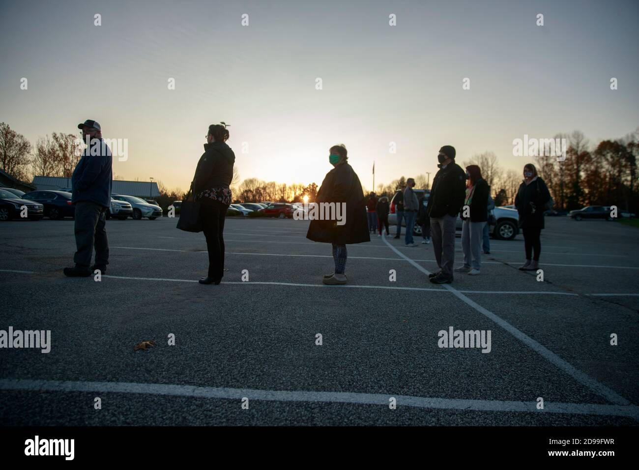 Voters line up on Election Day 2020 to cast their ballots at St. John ...