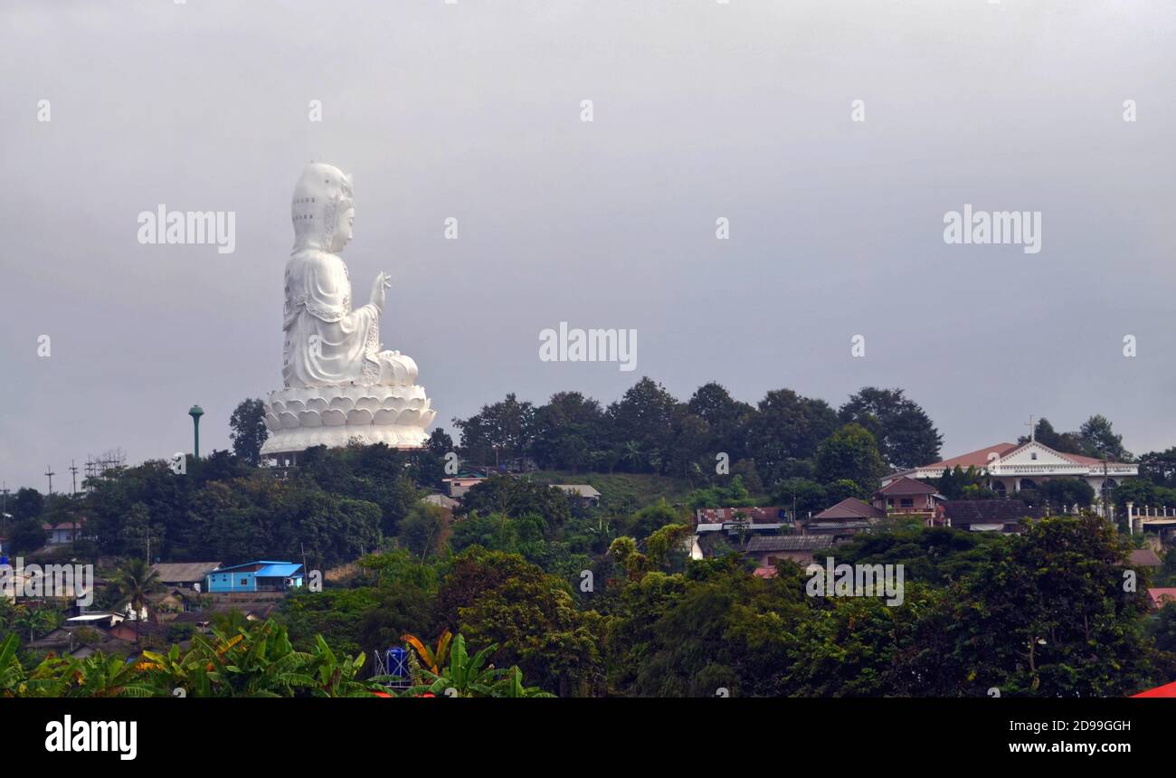 Chiang Rai, Thailand - View of Guan Yin Statue in the fog Stock Photo ...