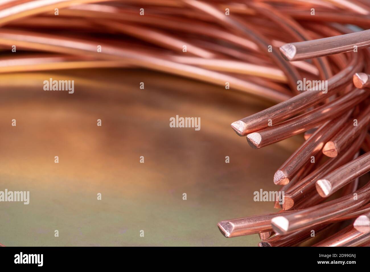 Copper wire on shiny metallic surface Stock Photo - Alamy