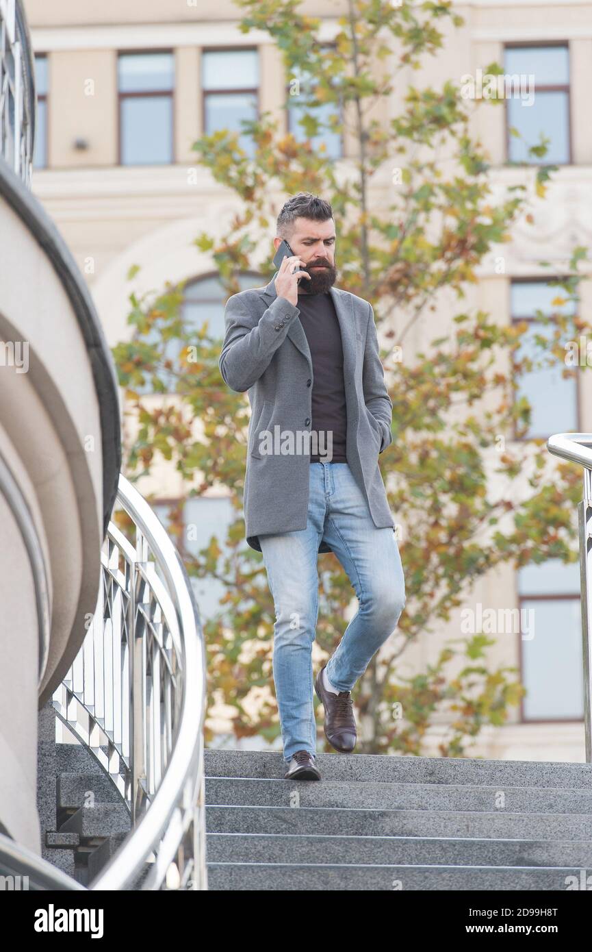 Man coming down stairs hi-res stock photography and images - Alamy