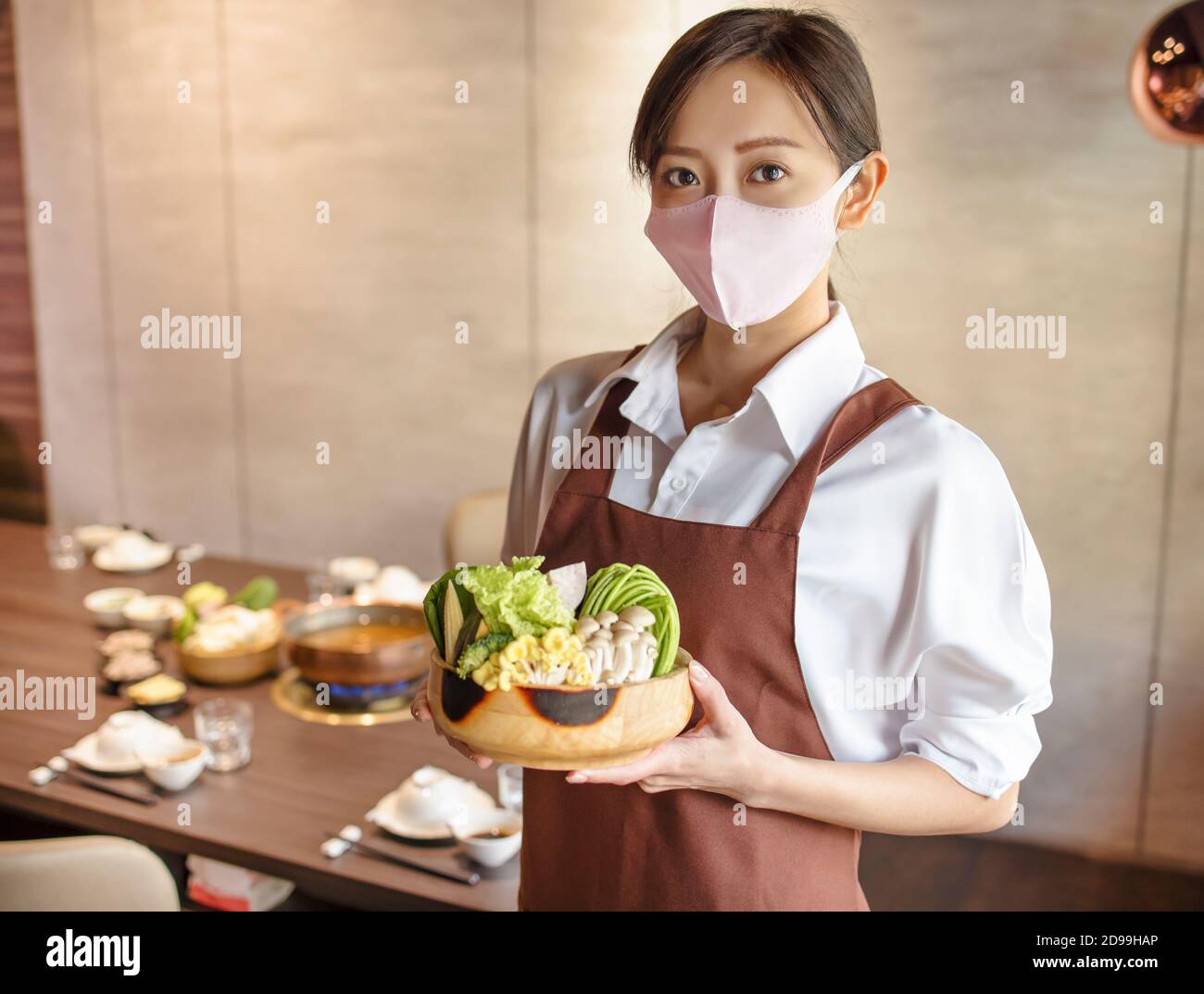 Chinese waitress serving in restaurant hi-res stock photography and ...