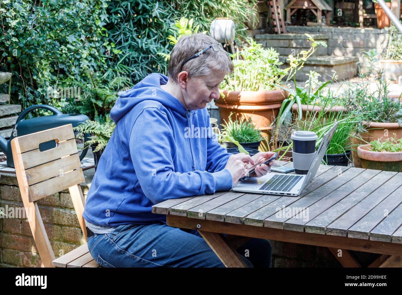 A female consultant doctor working from home during the coronavirus ...