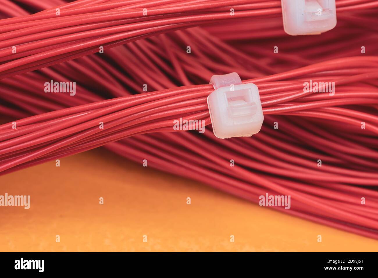 Bundle of red cabling of telecommunication network Stock Photo - Alamy