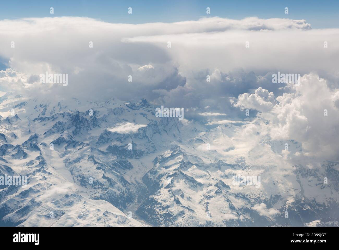 Fluffy white clouds, a view from airplane window. Top view Stock Photo ...
