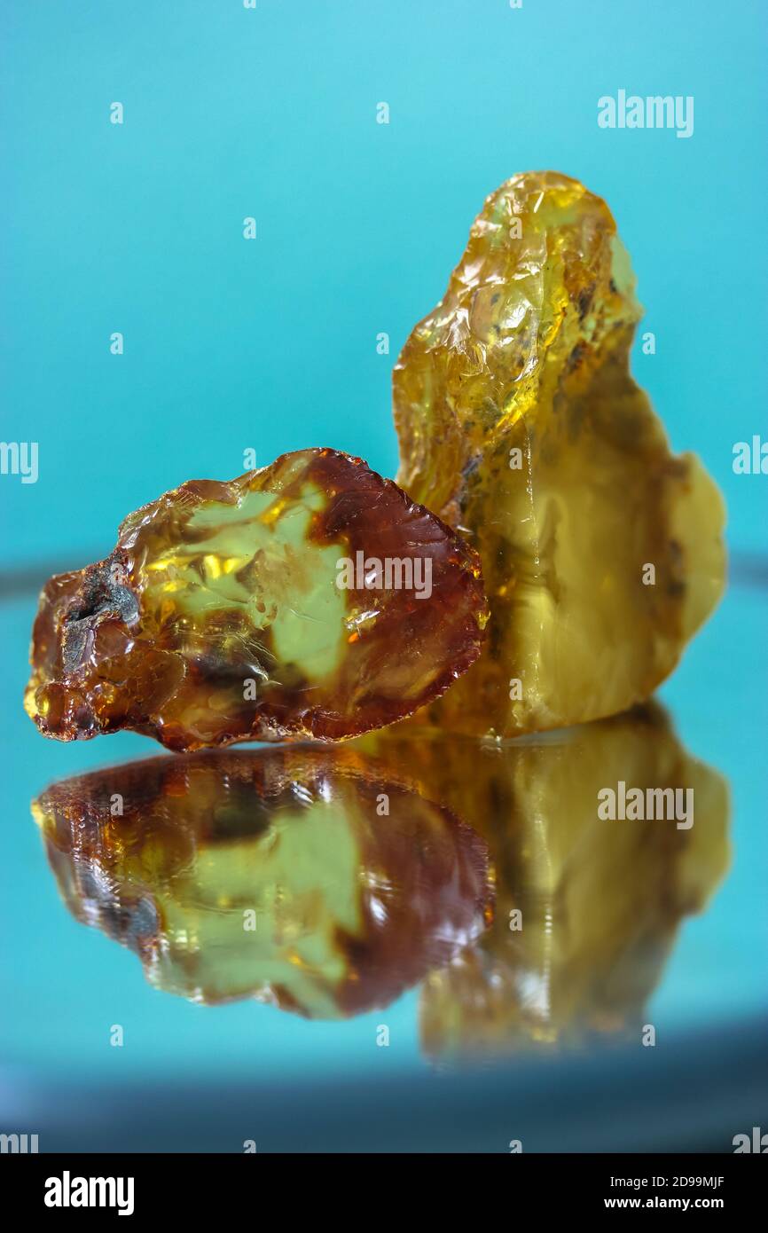 Natural close-up amber, yellow semi-precious stone, fossilized resin ...