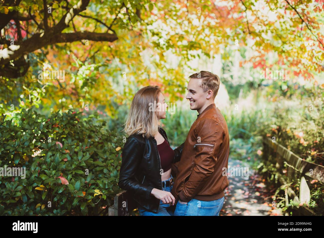 Young caucasian couple in love enjoys a moment of happiness in nature ...
