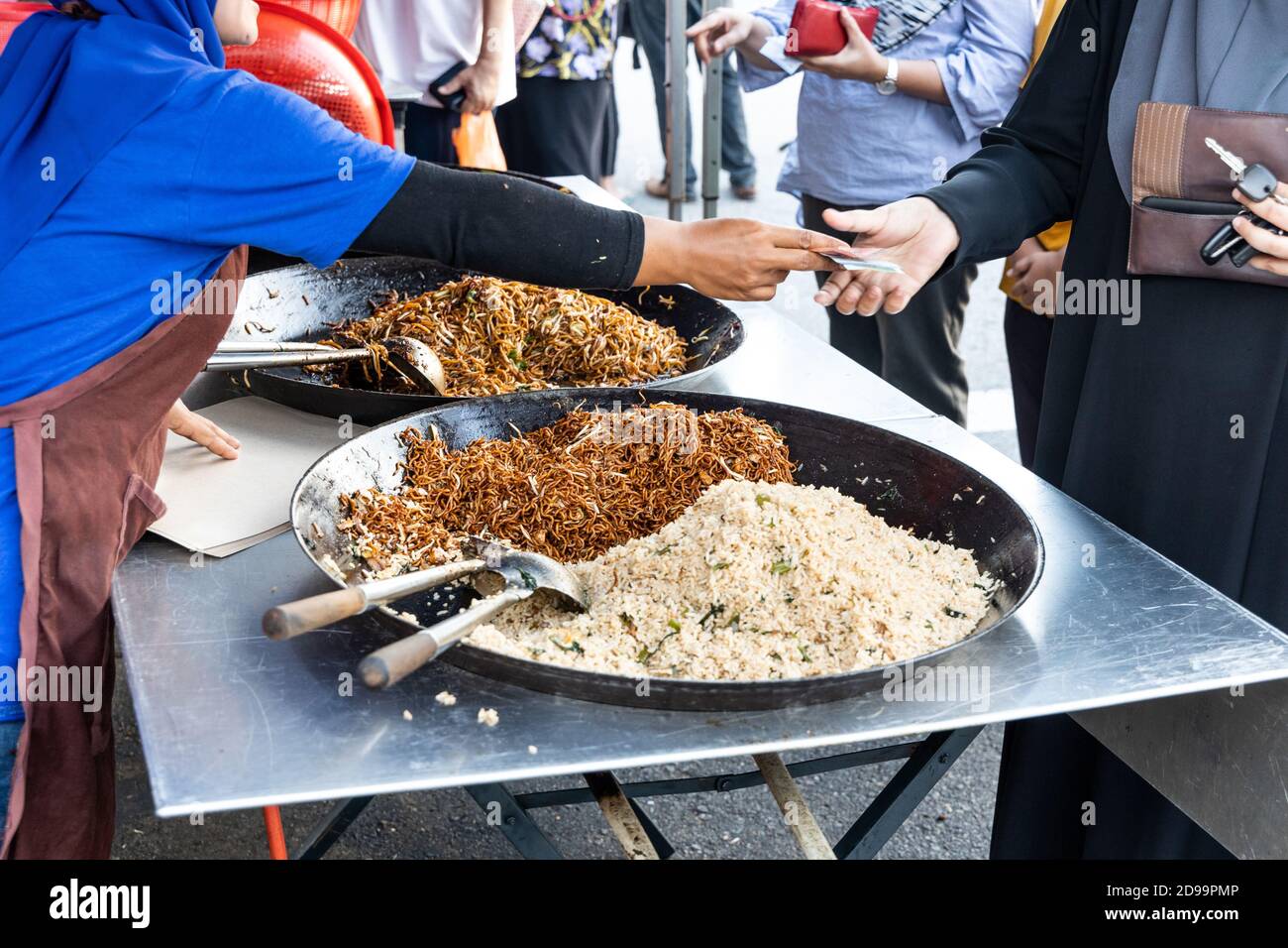 Vendor selling simple fried rice noodle in street market bazaar Stock ...