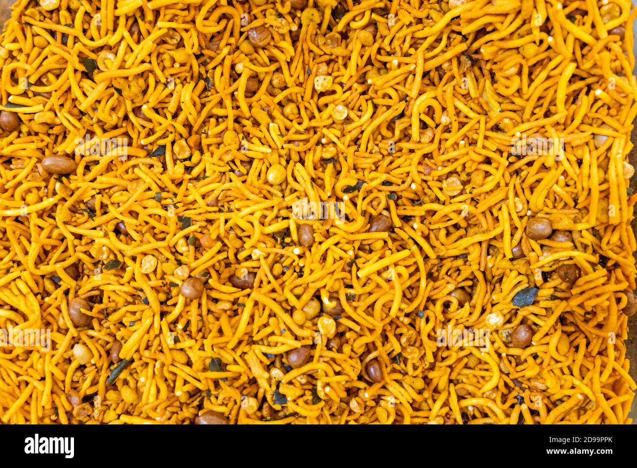 Closeup on Muruku mixture, savoury, crunchy snack as graphic resource ...