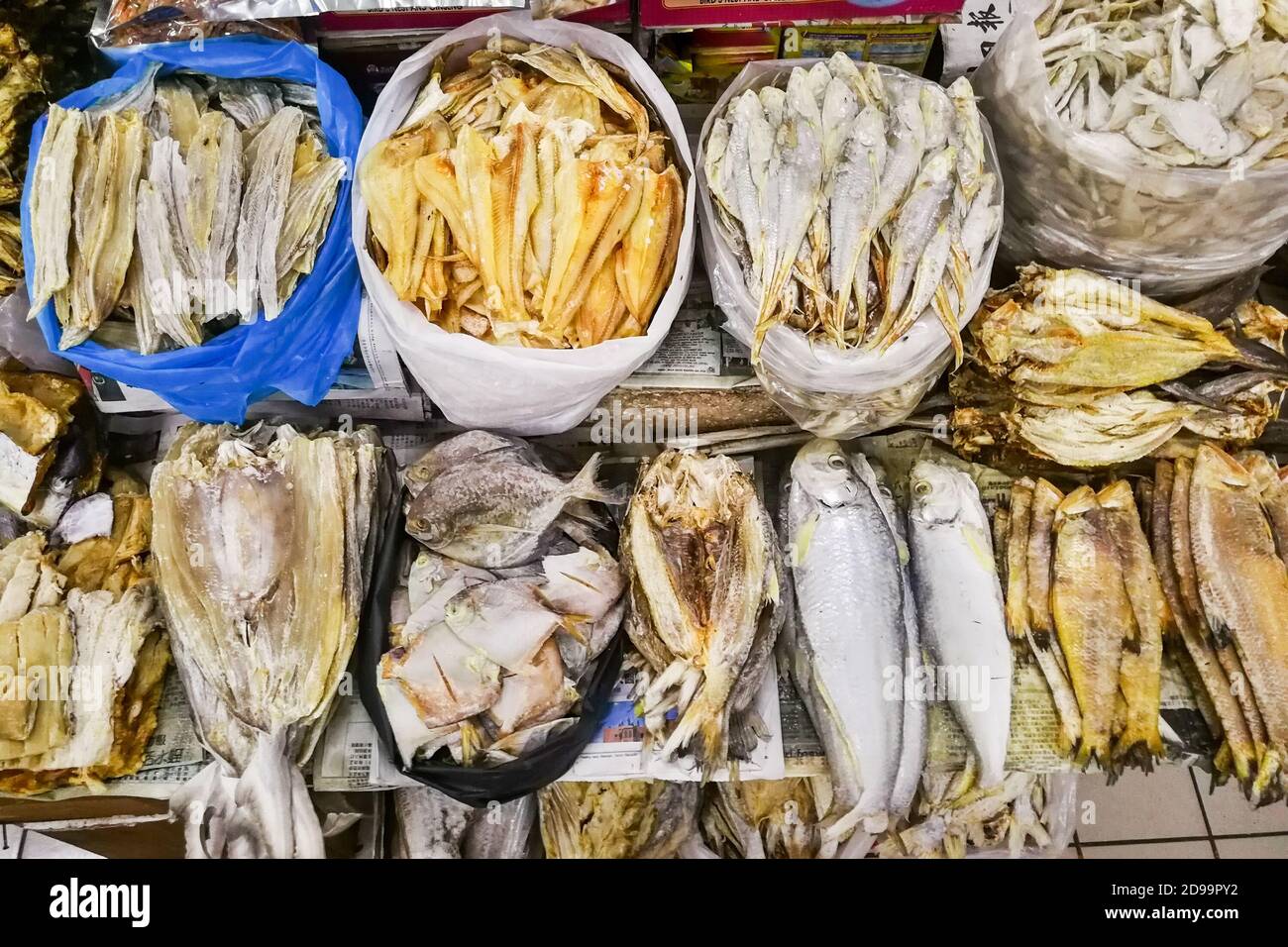 Unhealthy salt dried preserved salted fish seafood at market stall ...