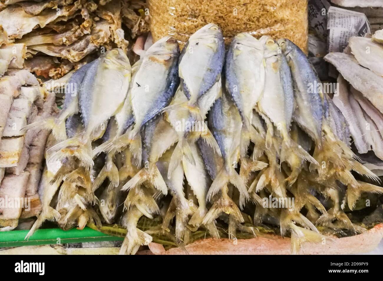Unhealthy salt dried preserved salted fish seafood at market stall ...