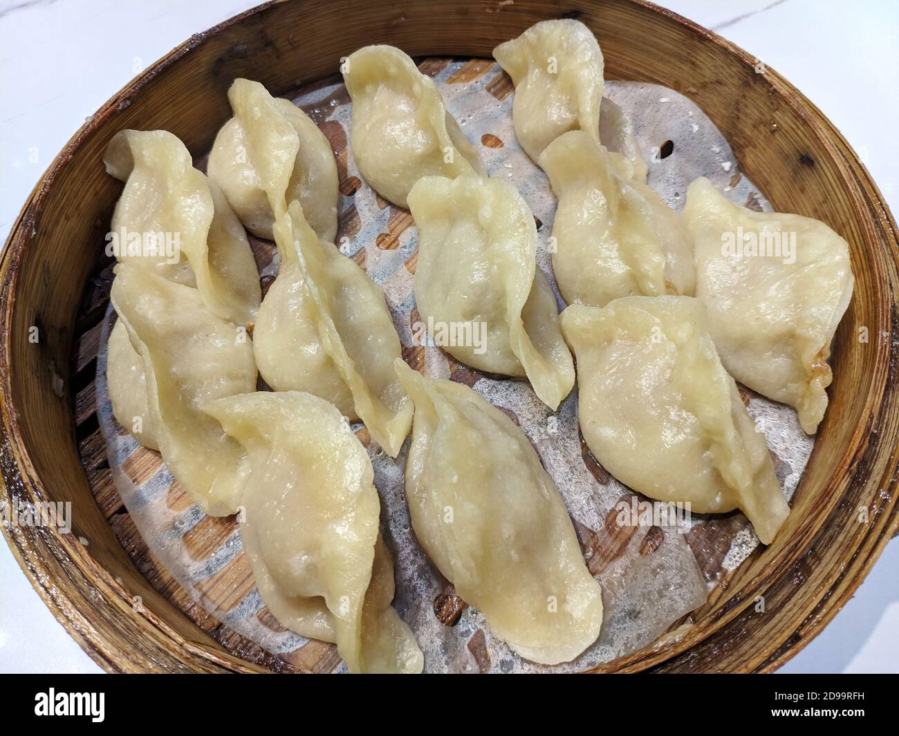 group of fresh dumplings on the steamer ready for eating Stock Photo ...