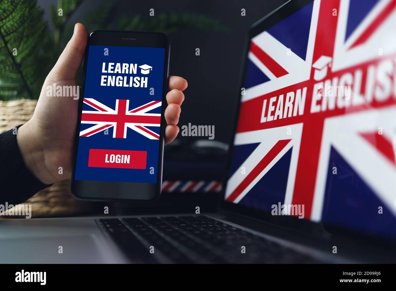 Learning foreign languages online. Woman holding smartphone with app ...