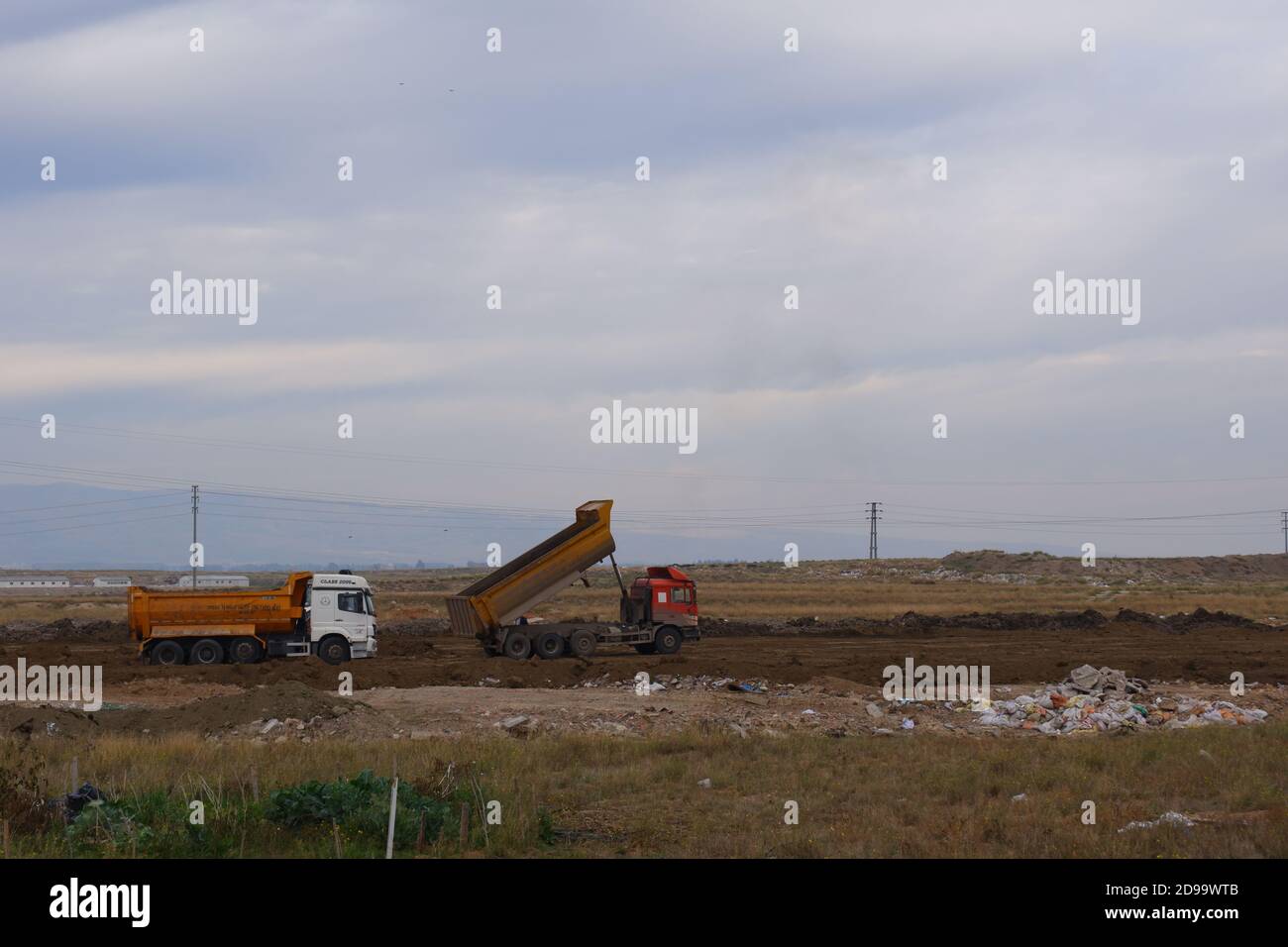 Construction trucks silhouette in hi-res stock photography and images ...