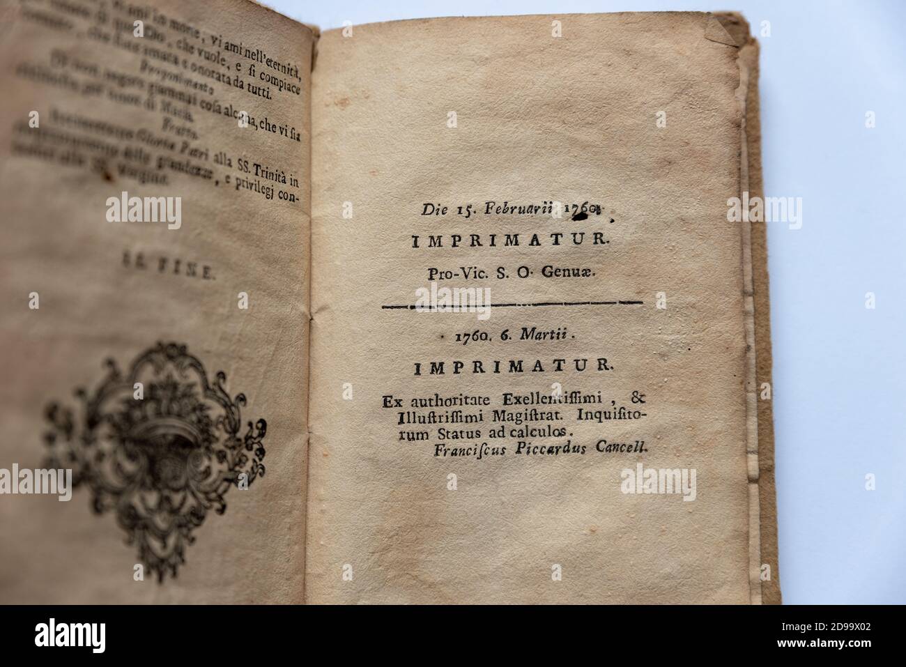 Top view of the inside pages of a very old Italian Catholic book ...