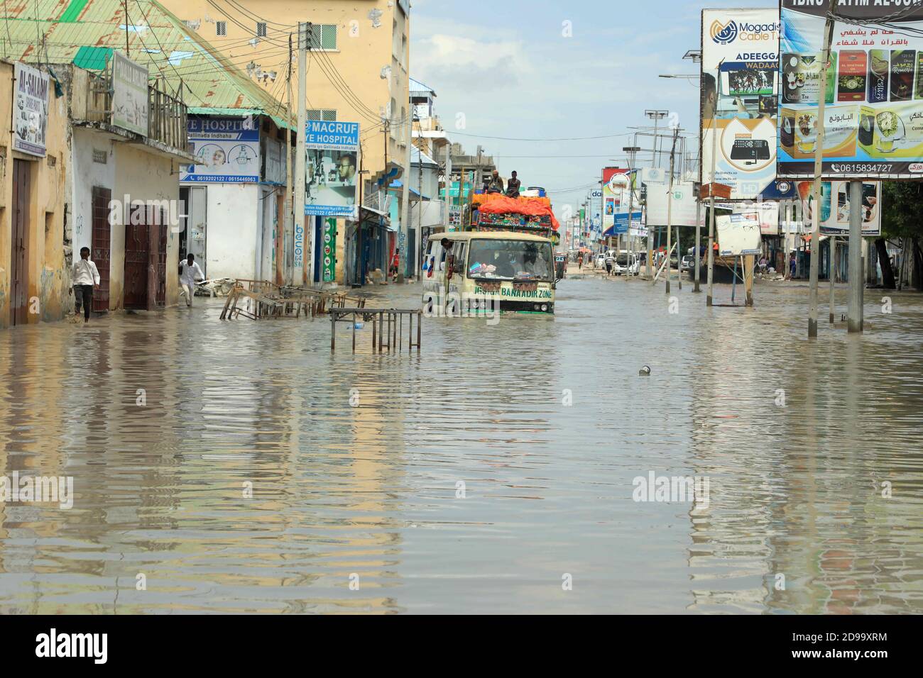 Mogadishu, Somalia. 2nd Nov, 2020. A vehicle wades through a flooded ...