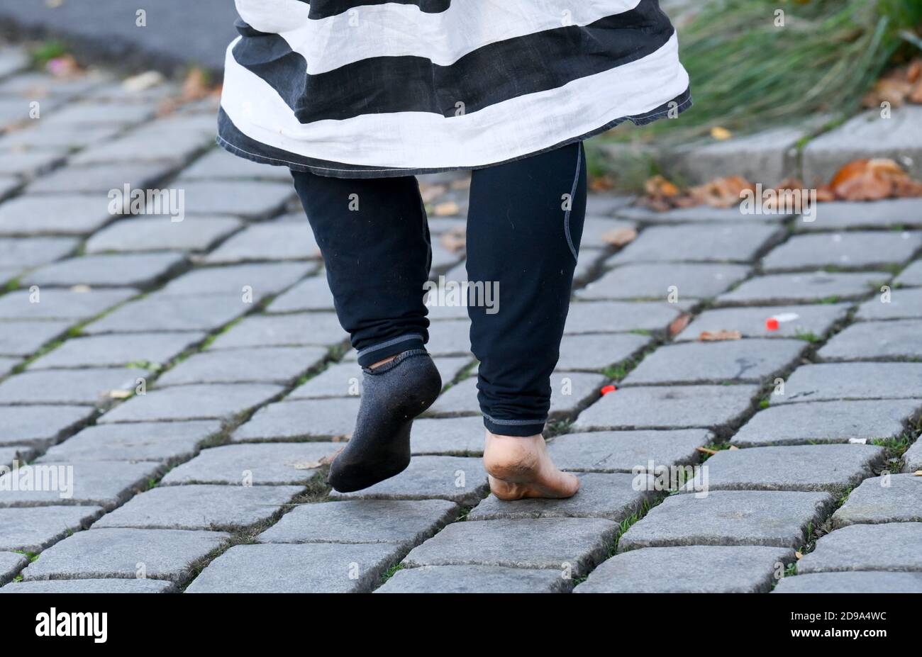 Homeless woman barefoot hi-res stock photography and images - Alamy