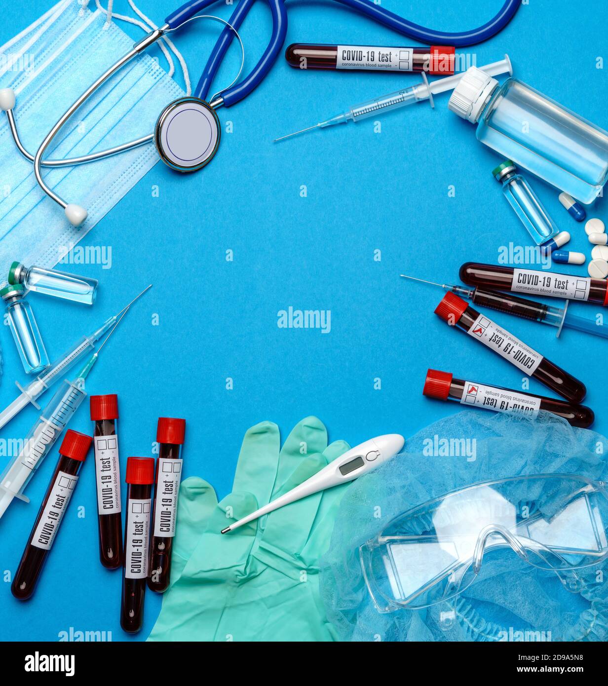 Frame made of medical equipment on blue background Stock Photo - Alamy