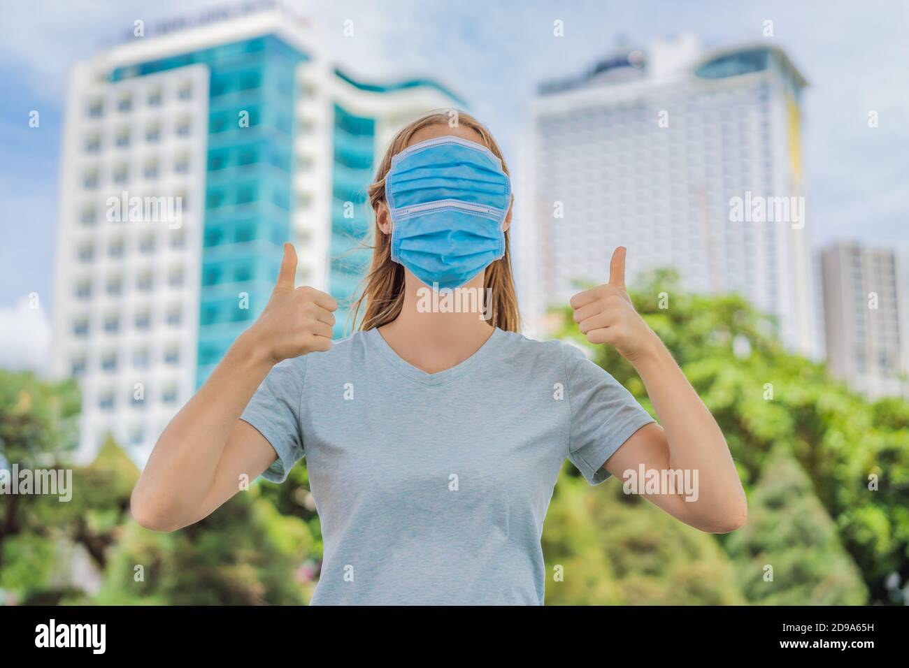 Improper wearing of mask concept. Woman wearing mask wrong Stock Photo ...