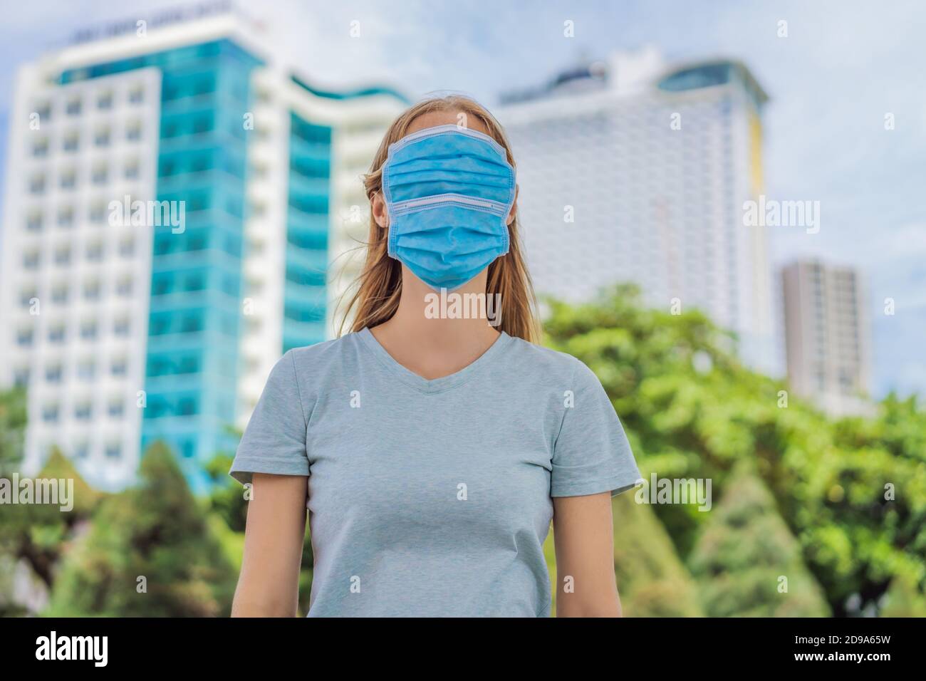 Improper wearing of mask concept. Woman wearing mask wrong Stock Photo ...