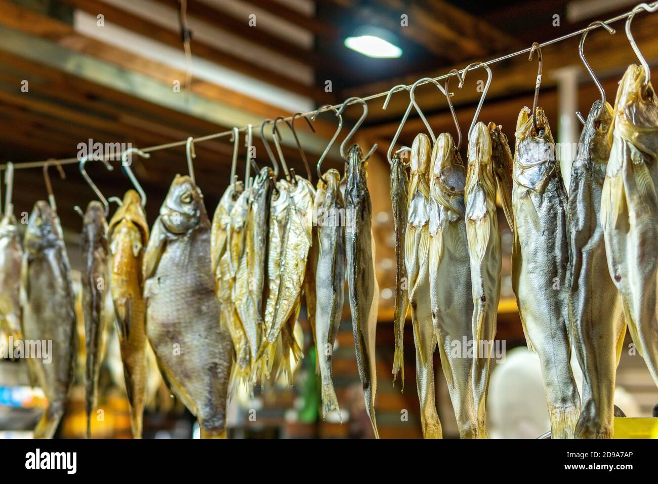 Popular ber snack - dried salty fish sold at the market. Street food ...