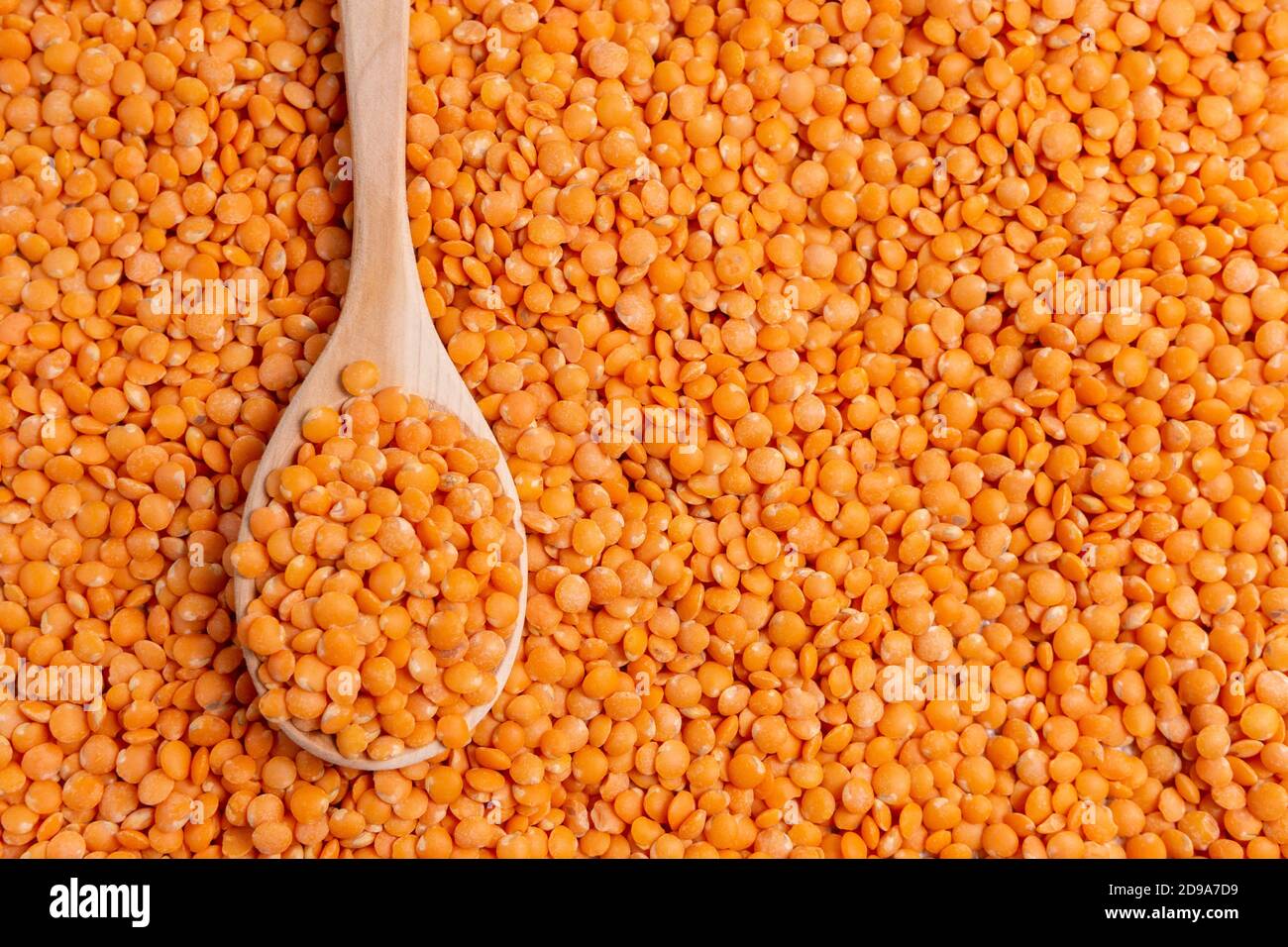 Healthy eating and dietary. Bowl of raw red lentil on wooden background ...