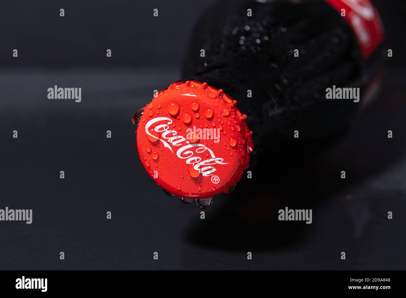 Tyumen, Russia-November 02, 2020: glass Coca Cola bottle with water ... Tyumen, Russia-November 02, 2020: glass Coca Cola bottle with water ...