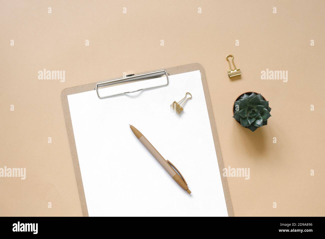 Workplace top view. Office supplies on a beige background Stock Photo ...