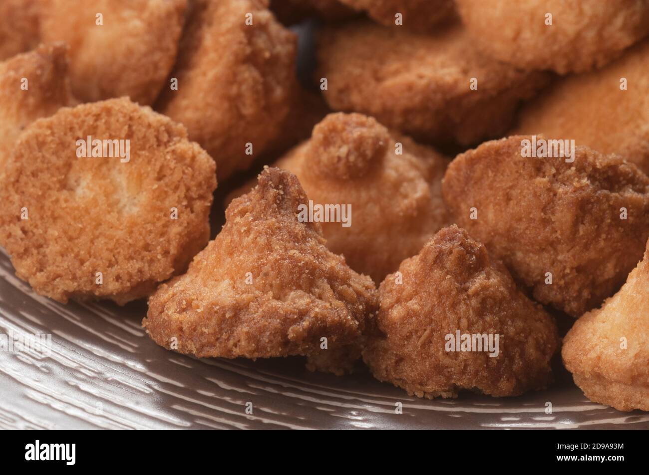 Coconut pastry on a timber board, close up Stock Photo - Alamy