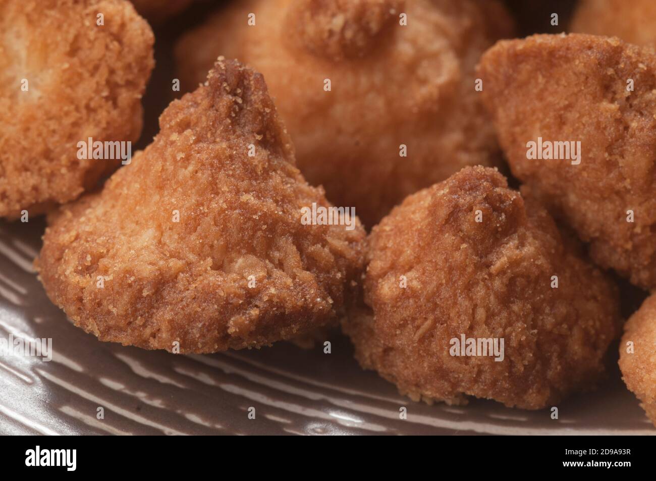 Coconut pastry on a timber board, close up Stock Photo - Alamy