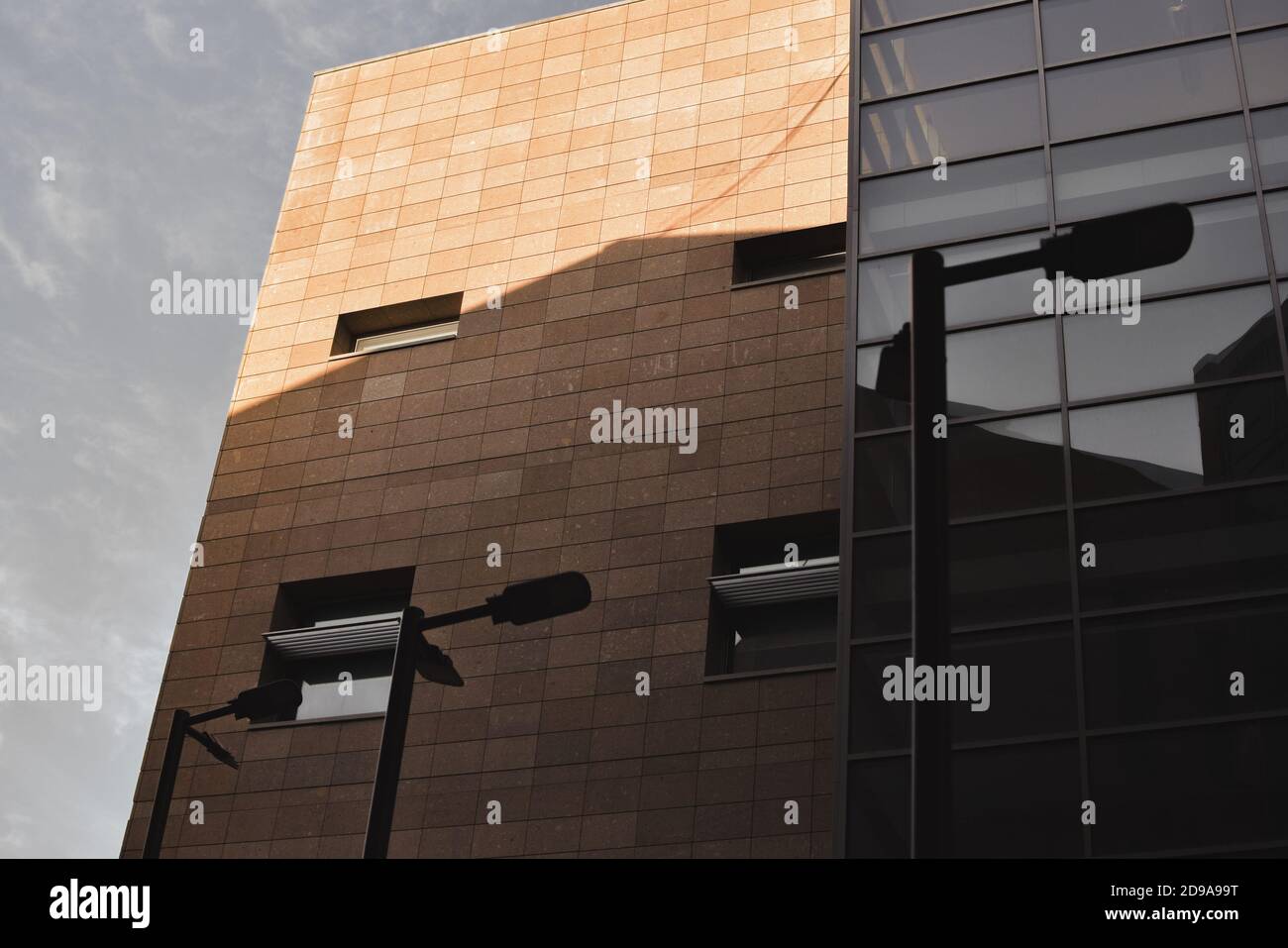 Low angle shot of a modern building architectural exterior walls with ...