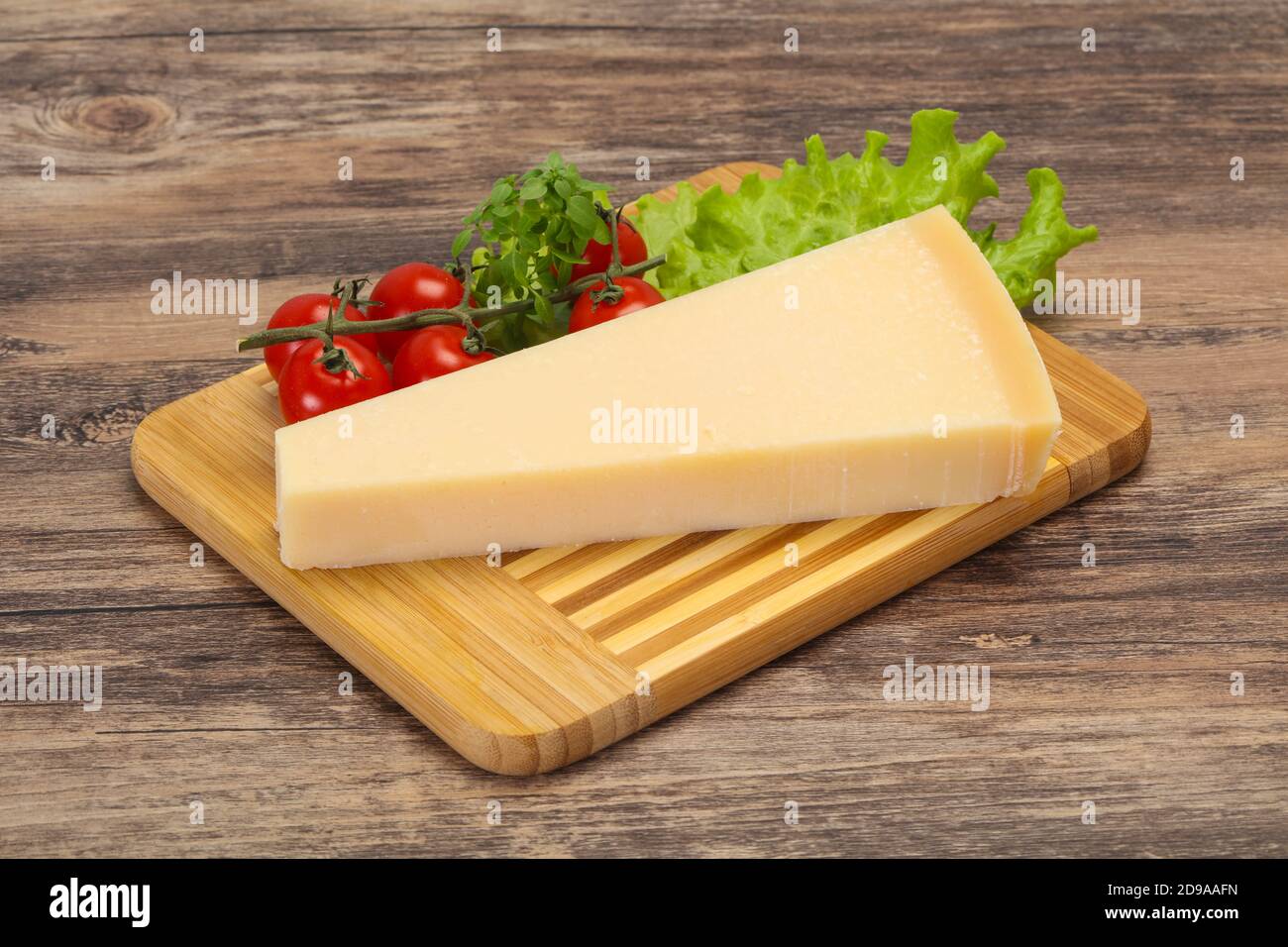 Italian traditional parmesan cheese triangle served salad Stock Photo ...