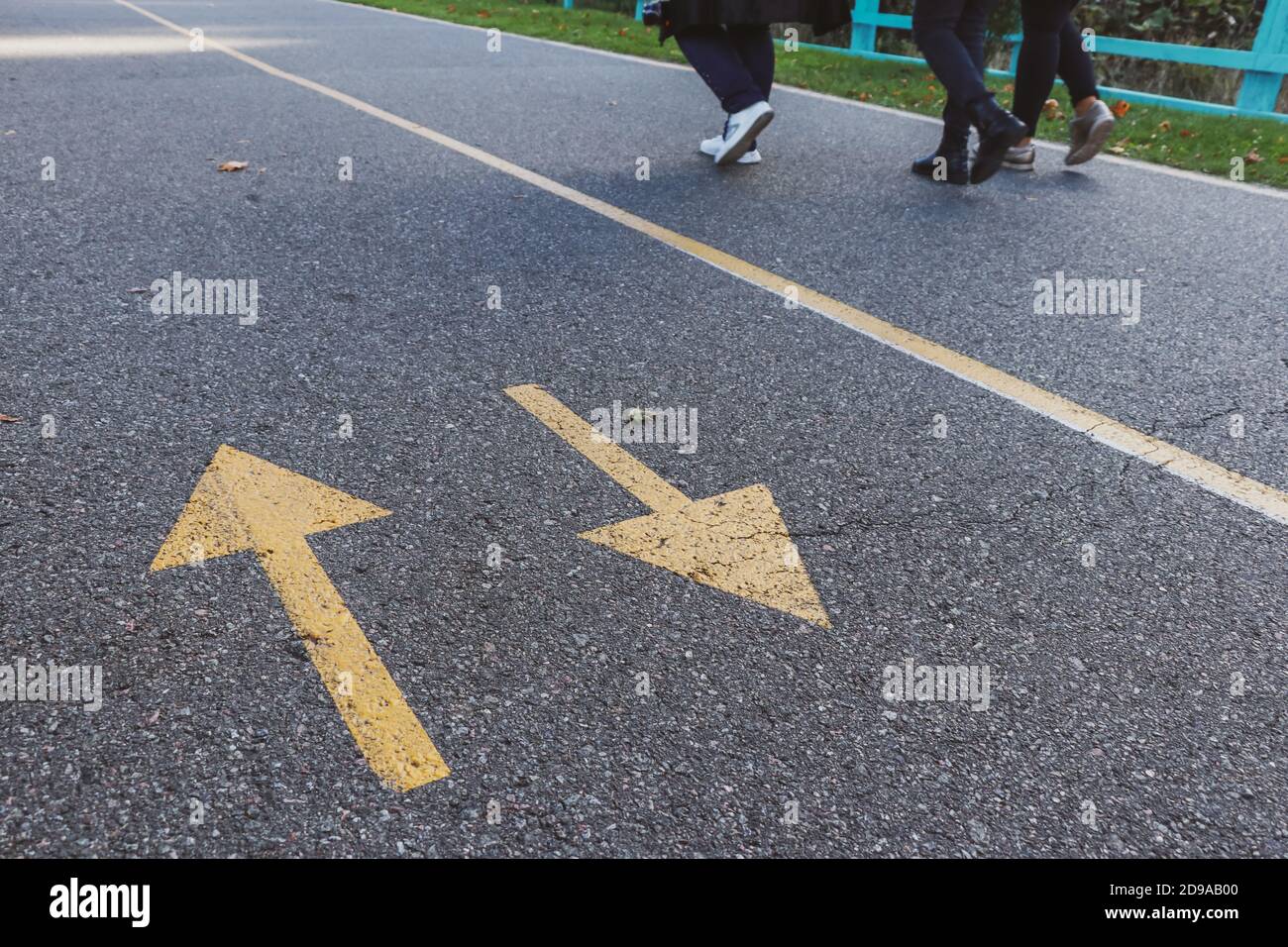 Arrows on pathway hi-res stock photography and images - Alamy