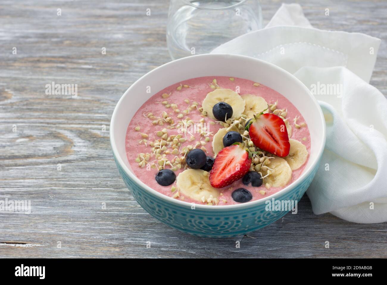 Healthy raw breakfast: porridge of sprouted green buckwheat with ...