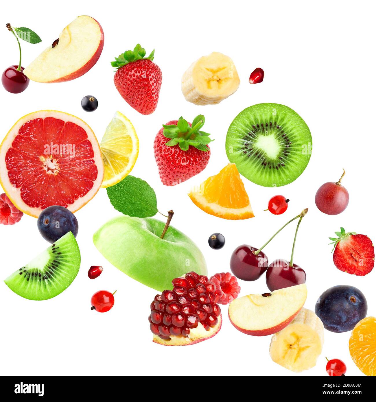 Mixed fruits on white background. Falling fruits Stock Photo - Alamy