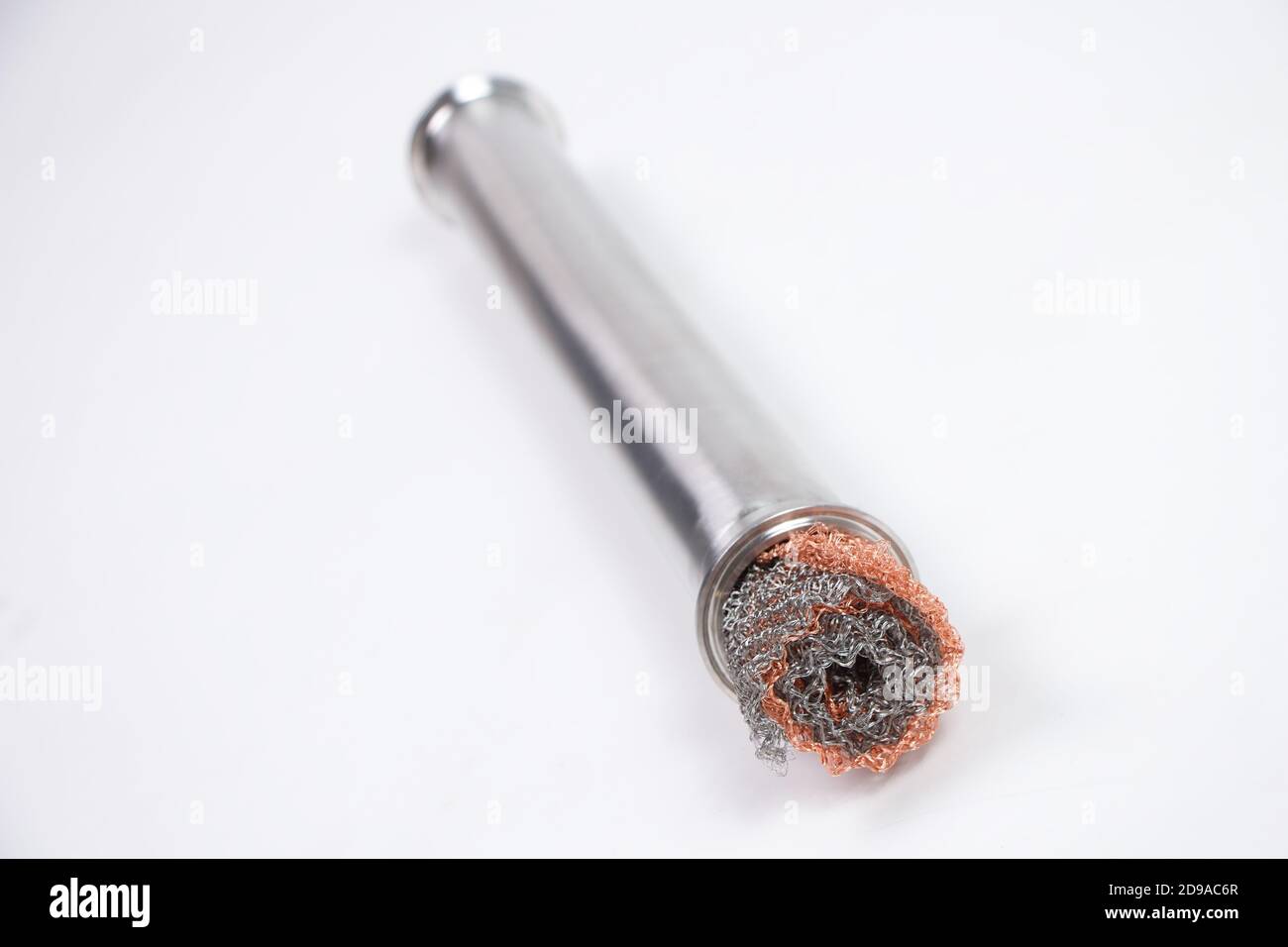 Isolated photo of metal rolled grid filter in iron pipe Stock Photo - Alamy