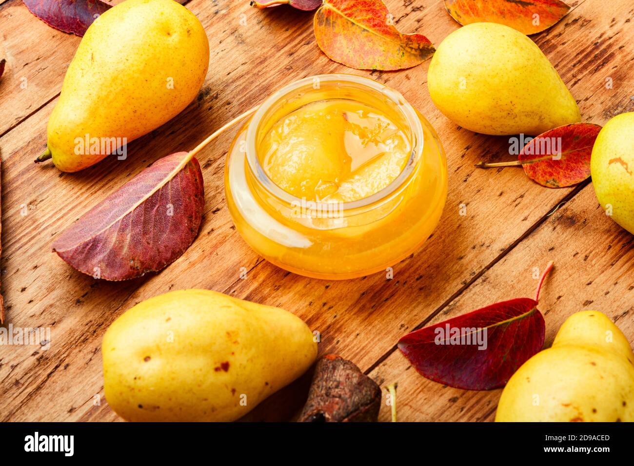 Glass jar with autumn homemade pear jam Stock Photo - Alamy