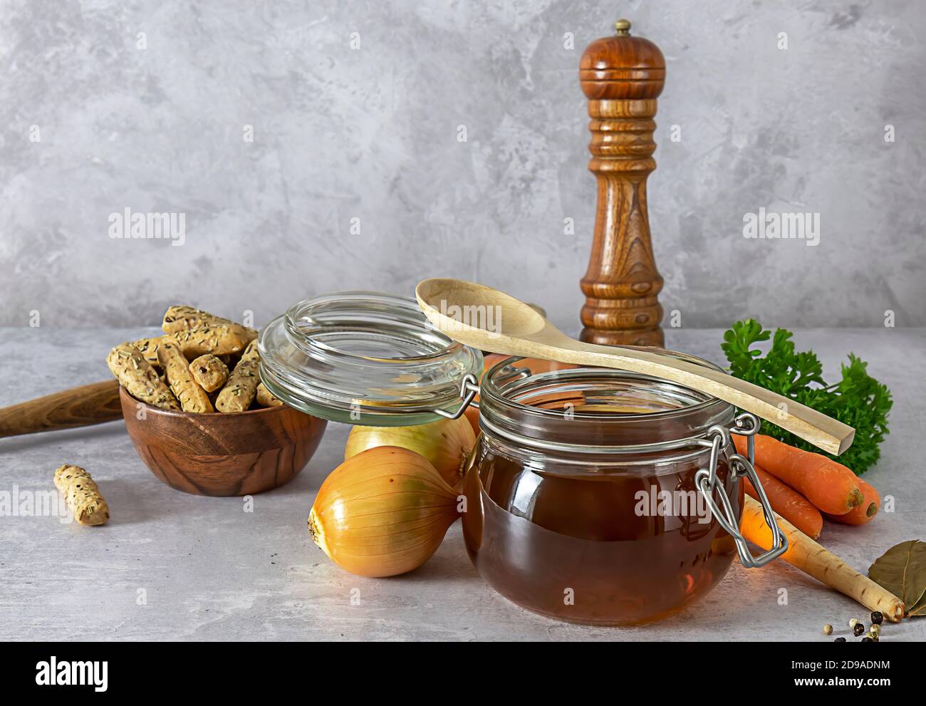 Homemade beef bone broth in a glass jar Stock Photo - Alamy