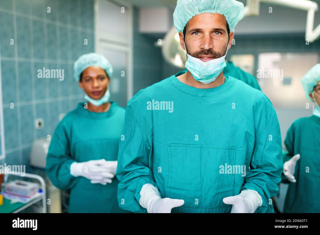 Team of surgeons in the operating room preparing for surgery Stock ...