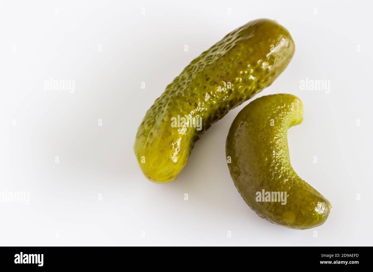 Pickles on white background with space for text Stock Photo - Alamy