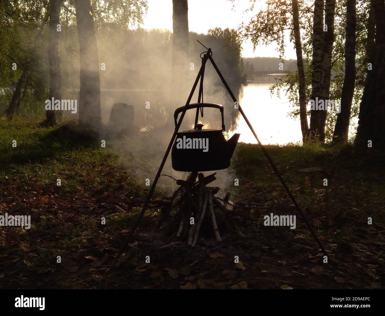 tourist pot kettle in the smoke over the fire cooking food for ...