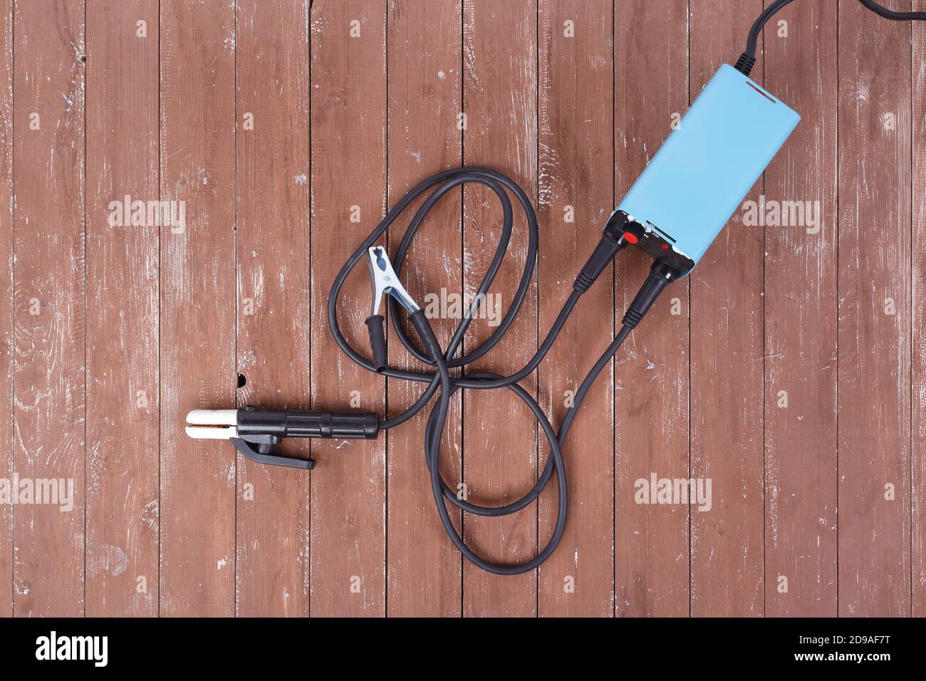 Industrial tool - Top view Welding machine on a wooden background Stock ...