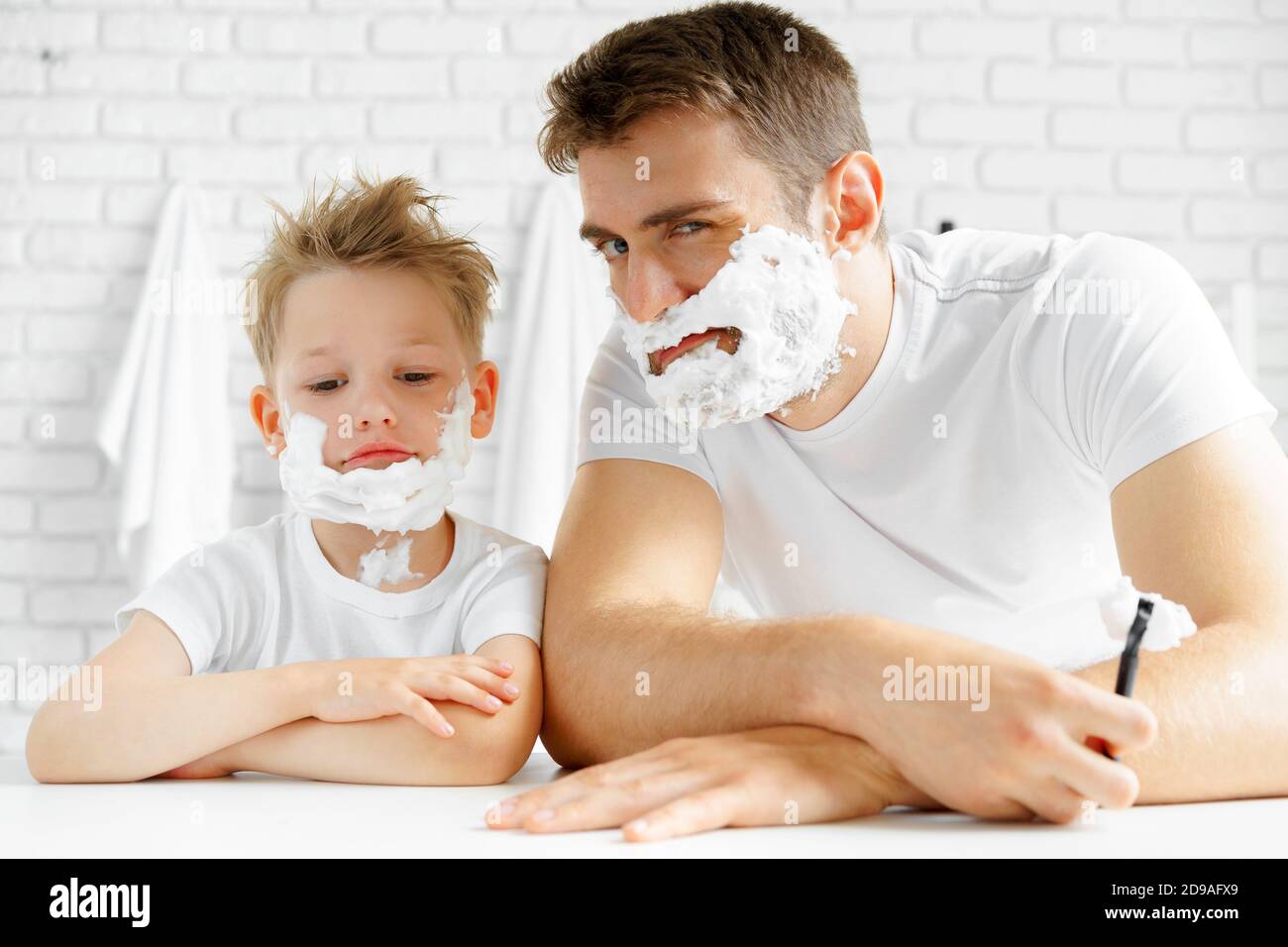 Father and his little son shaving together Stock Photo - Alamy