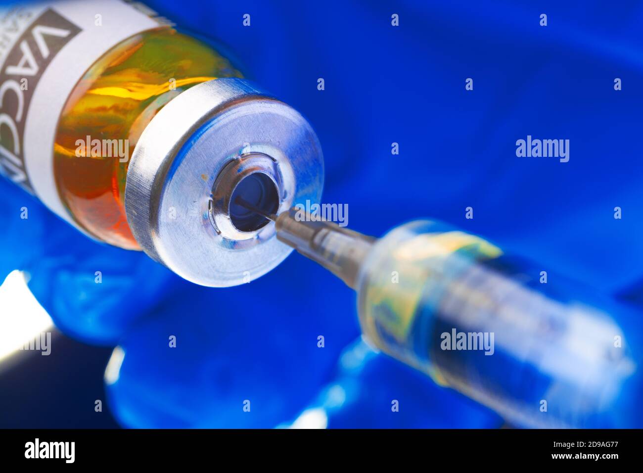 Medical vial with medication and syringe close up Stock Photo - Alamy
