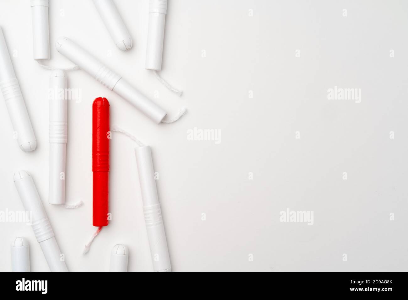 Red and white woman medical tampons on white background Stock Photo - Alamy