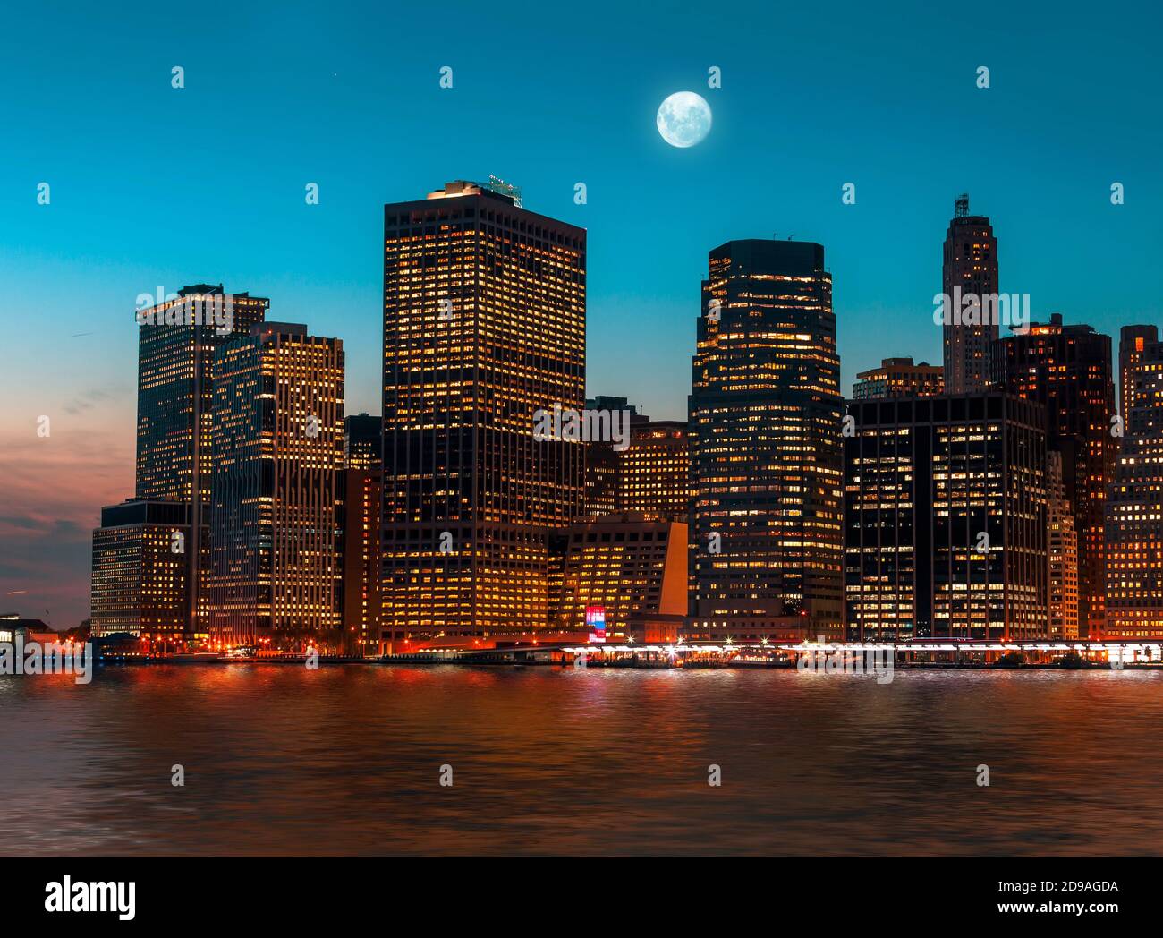 Manhattan at night with moon, lights and reflections. New York City ...