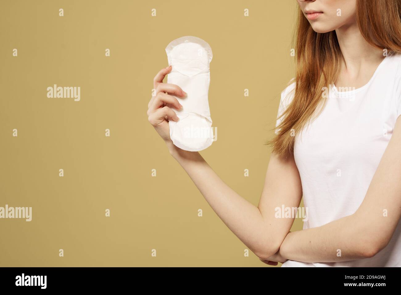 Woman with pad in hand menstruation critical days clean appearance ...